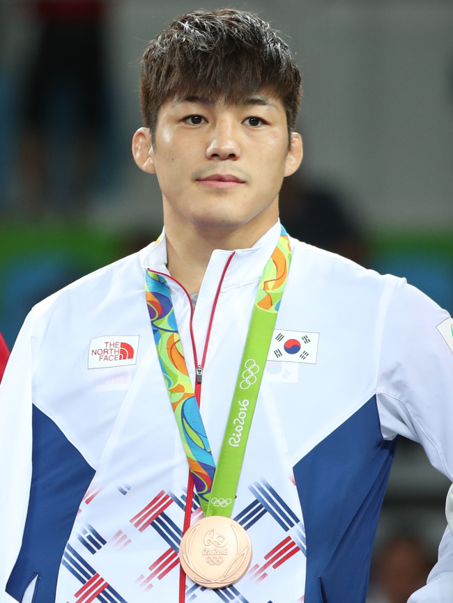 Korean wrestler Kim Hyeon-woo overcomes judging controversy to win ...