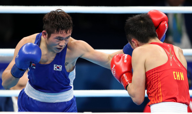 Lone Korean boxer loses in competition's 2nd round - The Korea Herald