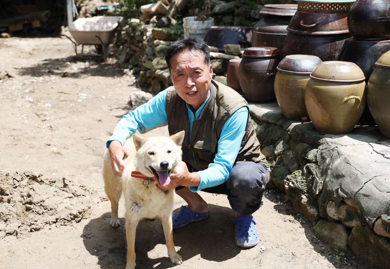 Dog makes miraculous return in village destroyed by landslide - The ...