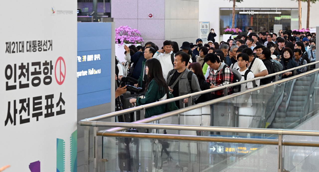 Millions flock to vote early; record-high turnout expected - The Korea ...