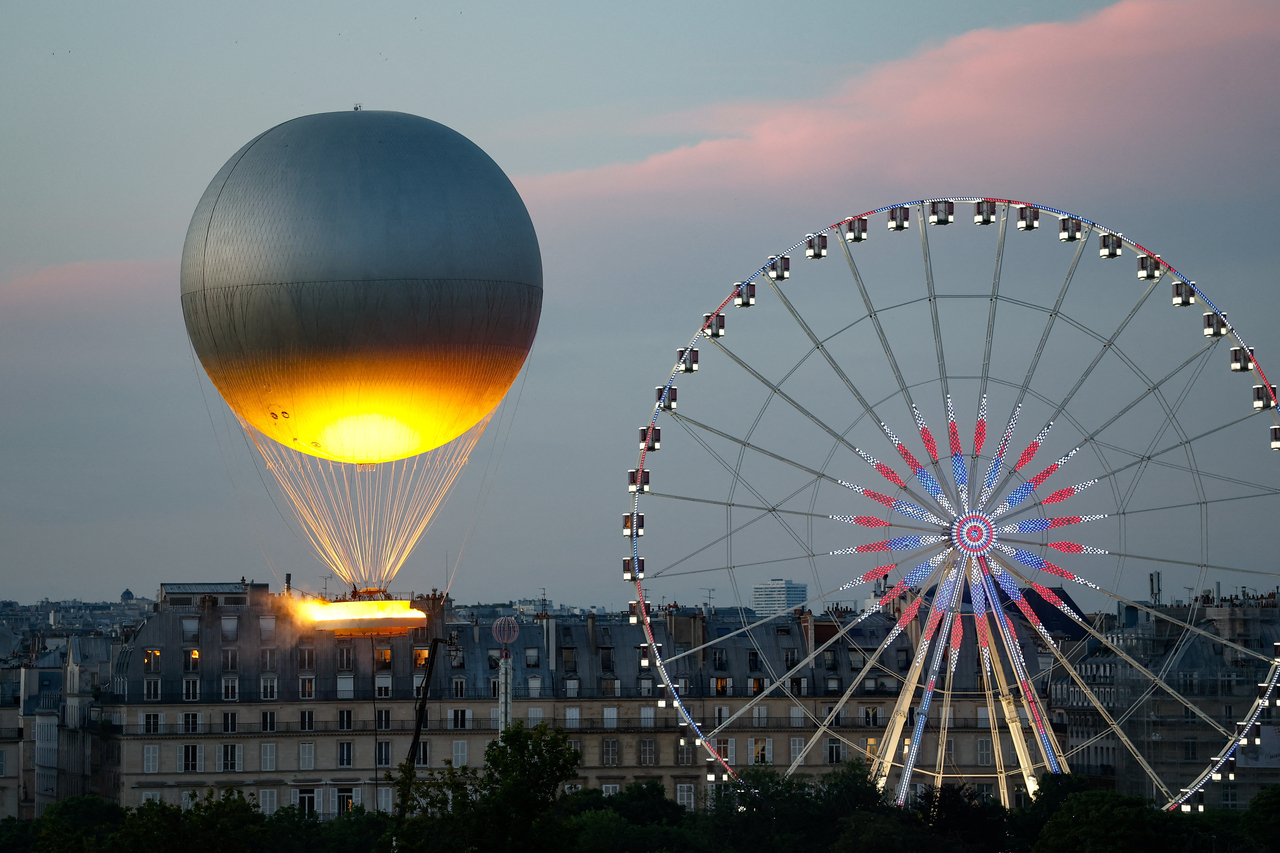 Iconic Olympic balloon rises again in Paris - The Korea Herald