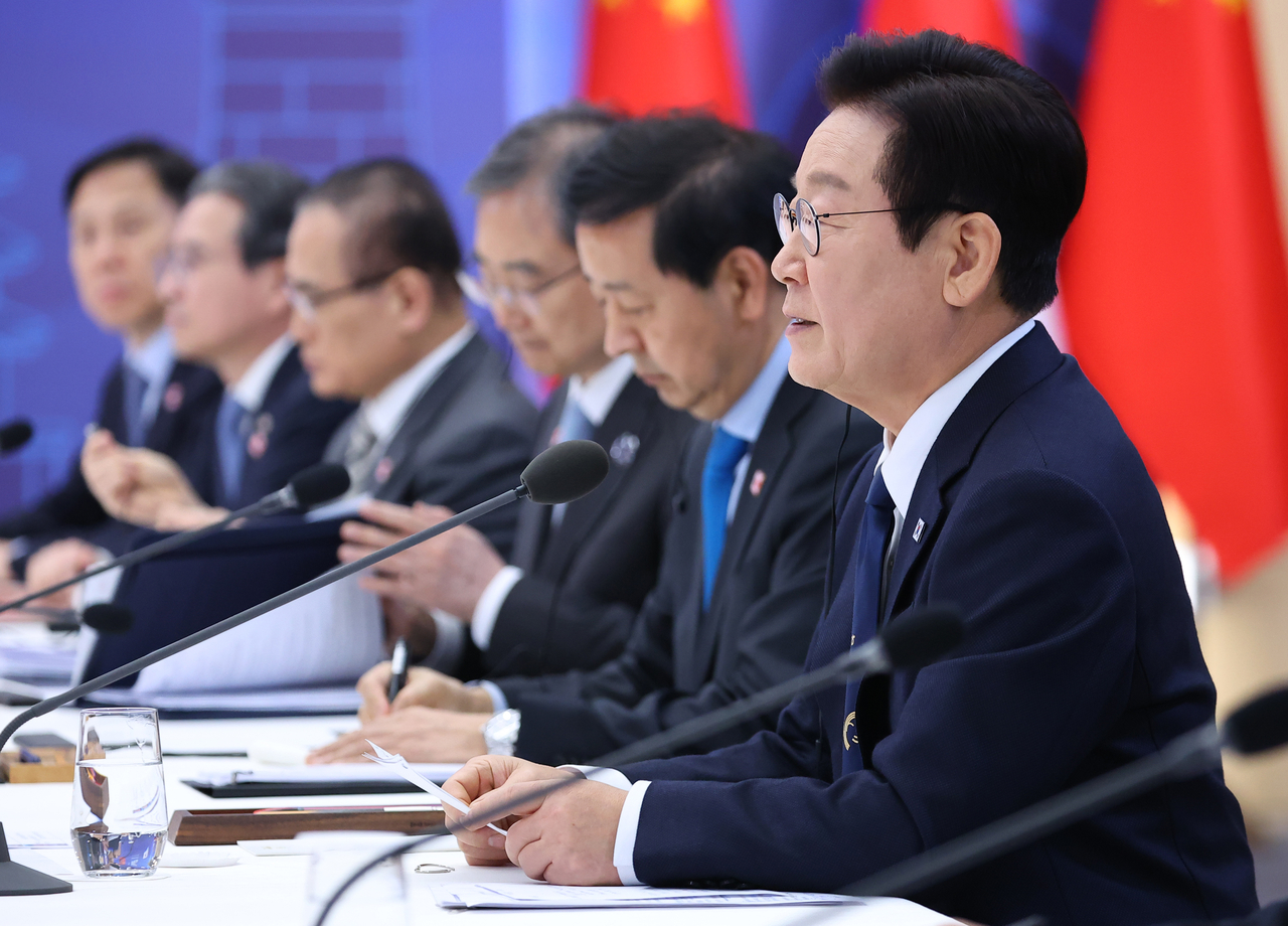 Lee, Xi agree to reboot high-level dialogue, turn thaw into economic ...