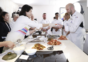 First lady shares Korean traditional food recipe with chefs, students ...