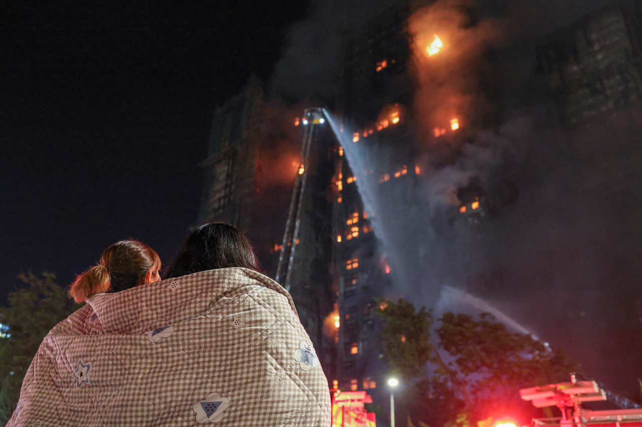 Hong Kong high-rise fire kills at least 44, still burning - The Korea ...