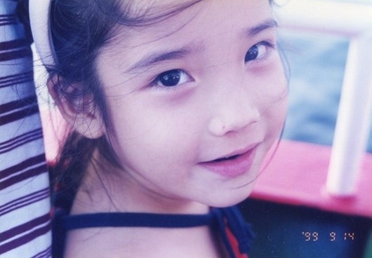 IU‘s childhood photos go viral - K-POP HERALD