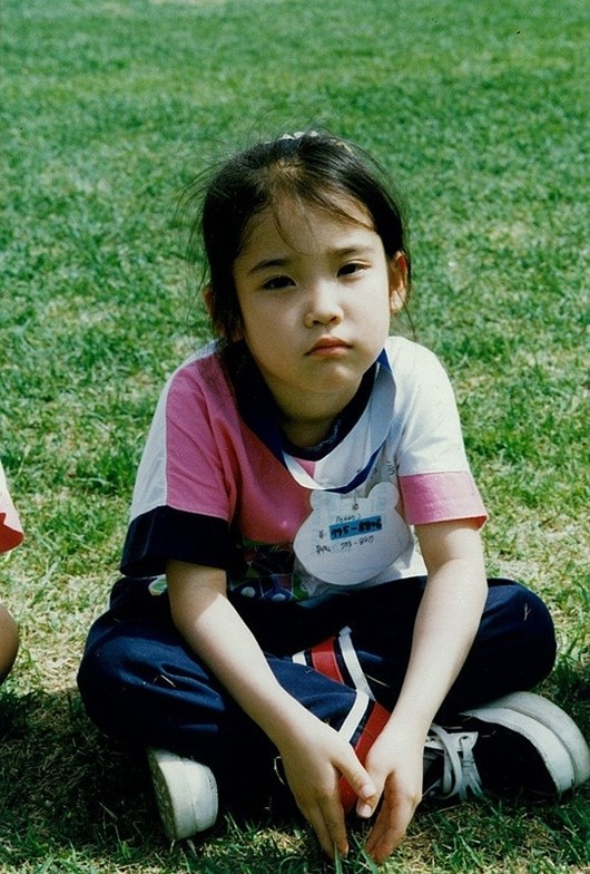 IU‘s childhood photos go viral - K-POP HERALD