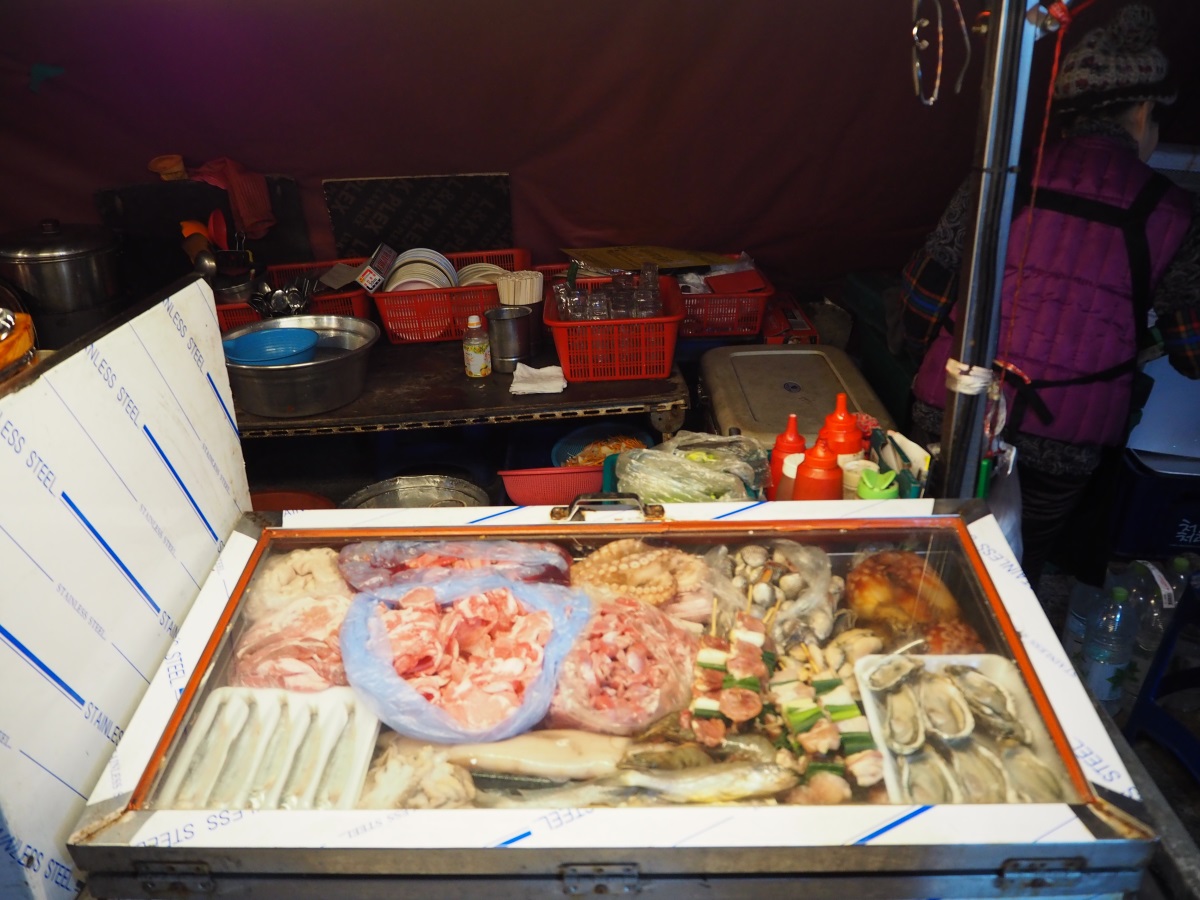 Chicken feet and more -- odd, must-have specialties at Korea’s tented ...